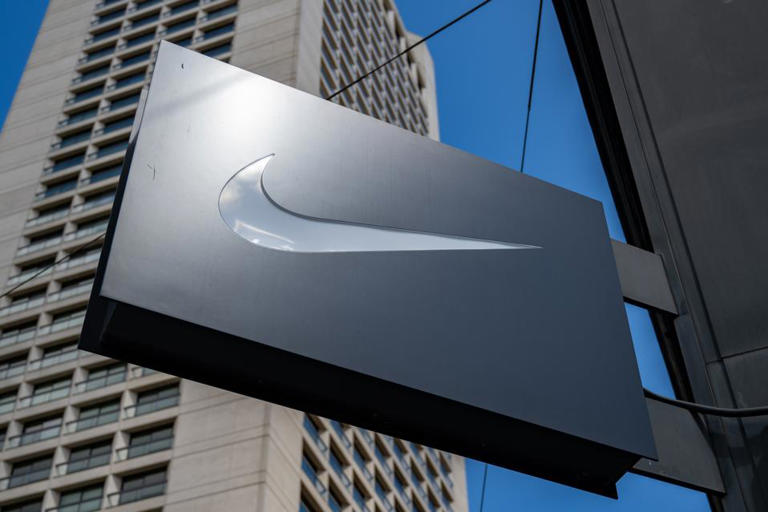 Nike shares pop after Tim Cook nearly doubles stake in the athletic ...
