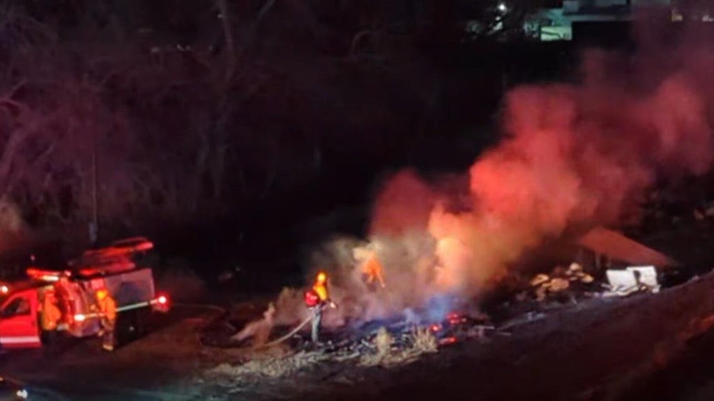 Colorado firefighters rush to put out grass fire burning near Franktown ...