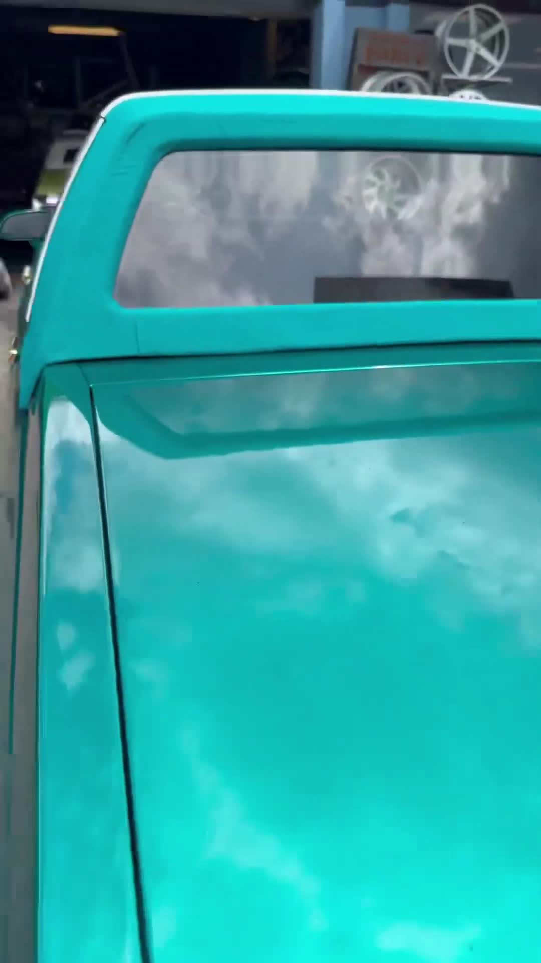 Candy teal box Chevy on gold 26’s Amani