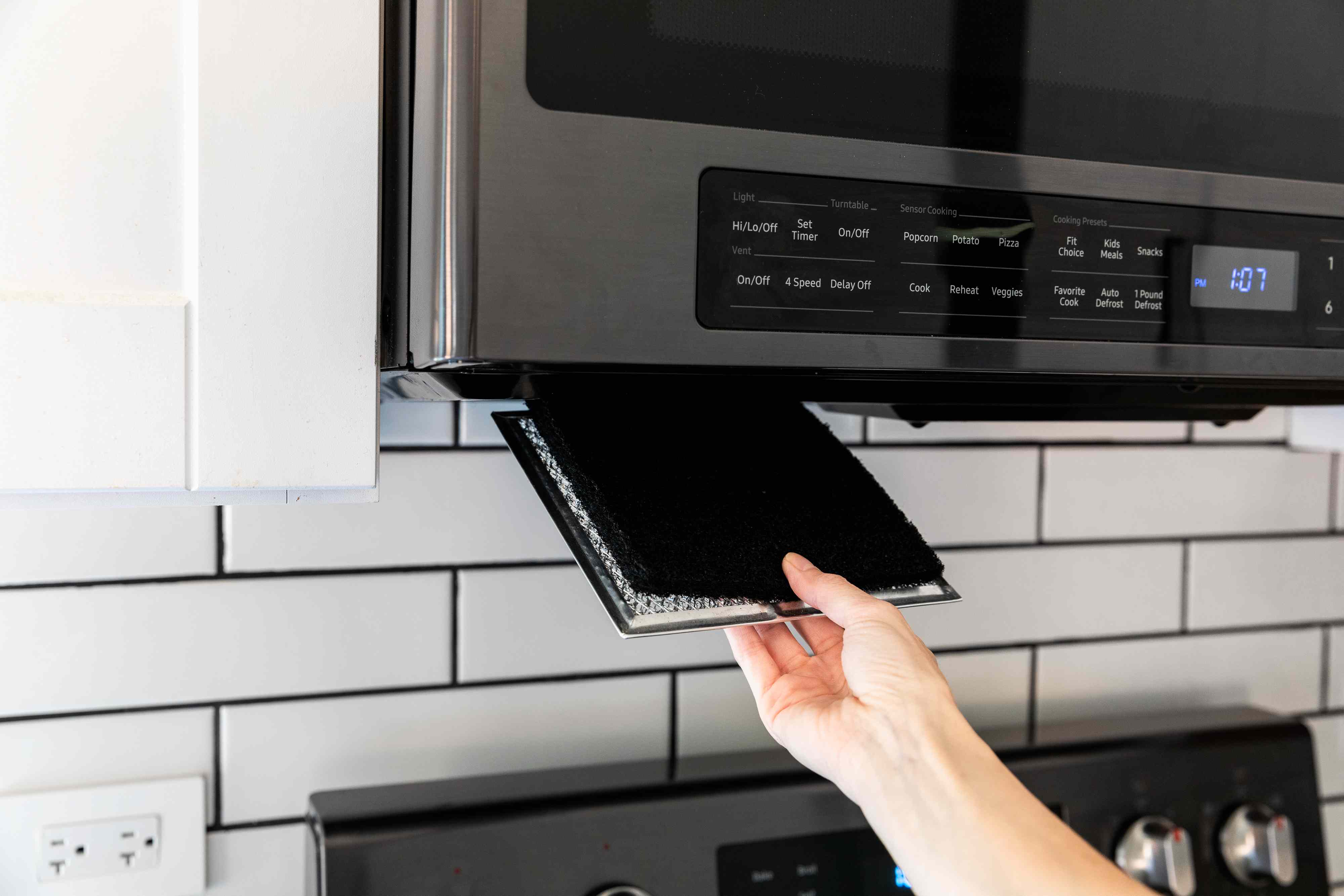 How to clean your microwave filter and finally get that layer of grease off