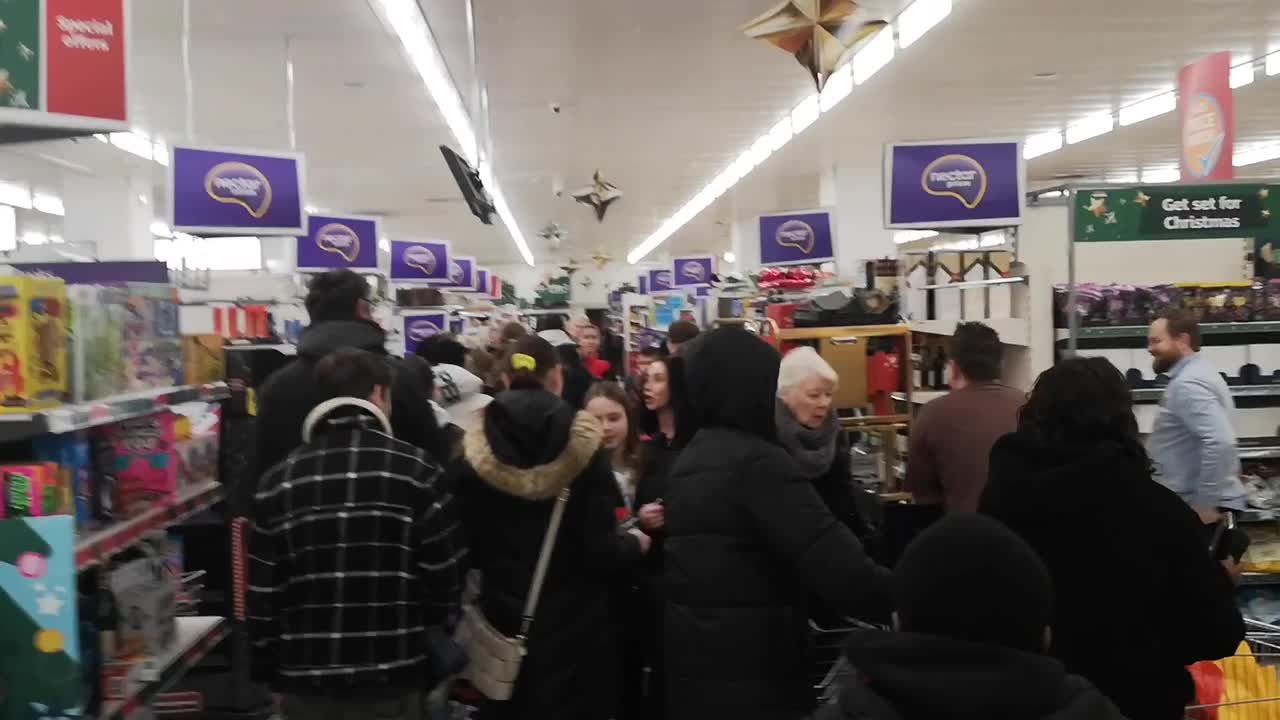 Christmas Eve chaos: Massive self-checkout lines at East London ...