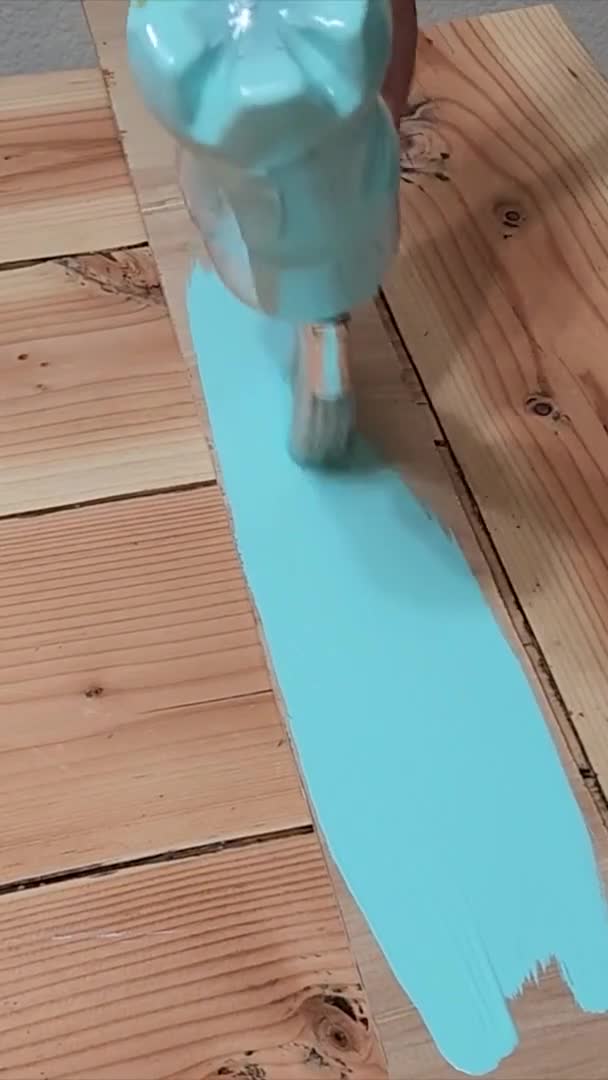 Drill a hole in your paint brush...