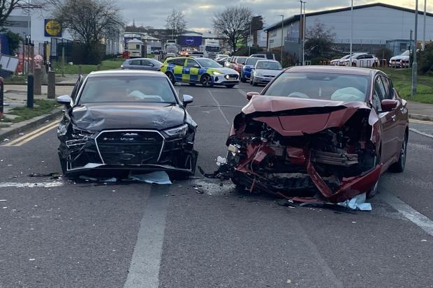 Two smashed up cars block road in Christmas Eve crash