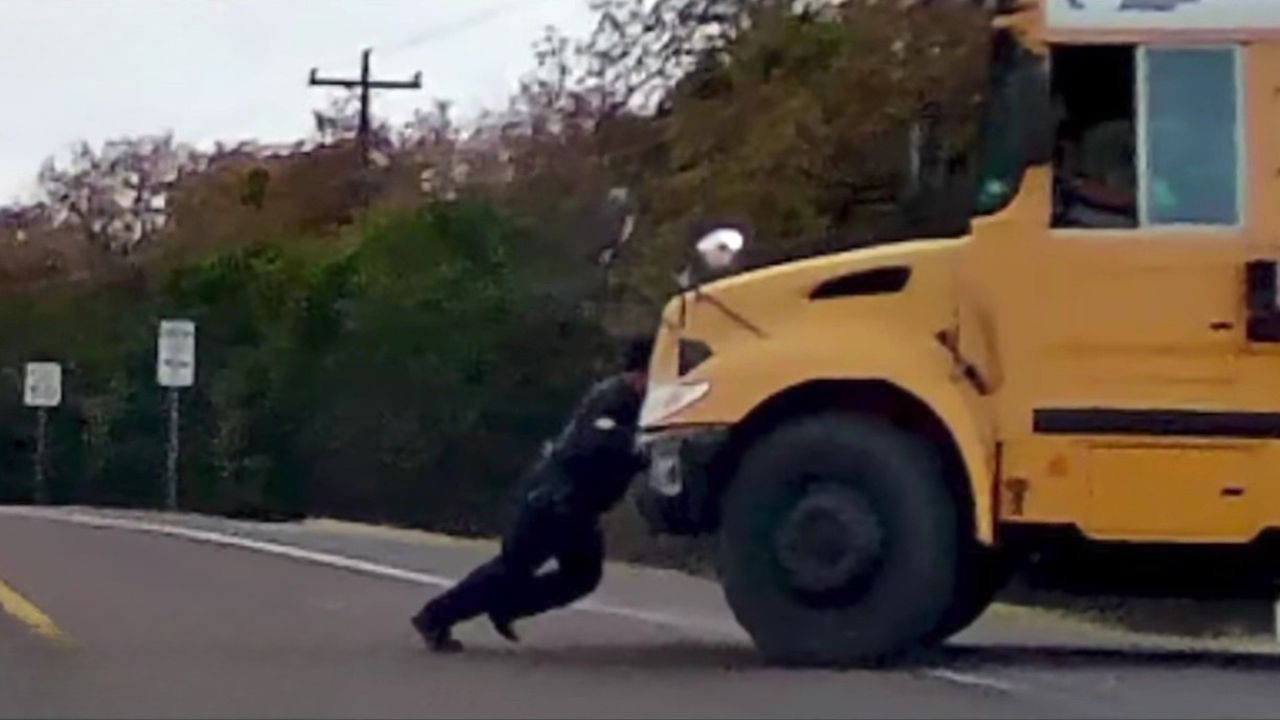 A 'herculean effort': Viral video shows officer physically pushing ...