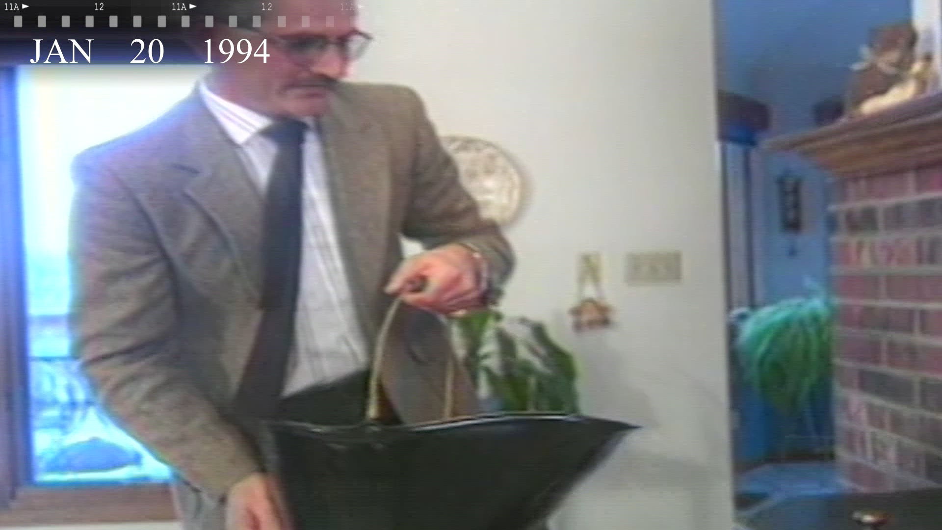 Nebraska man uses corn to fuel his fireplace during the winter in 1994