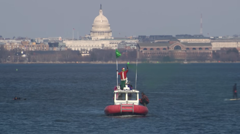Santa, reindeer, Grinch waterski on Potomac River in 40th annual tradition