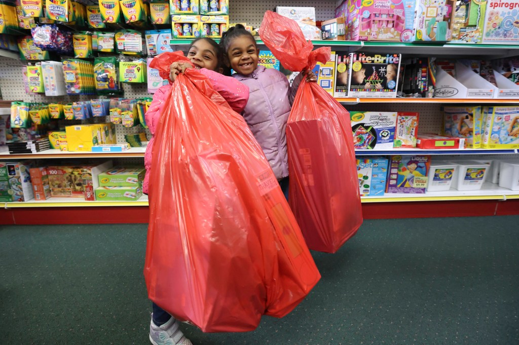 Homeless kids go on shopping spree at LI toy shop in ultimate Christmas ...