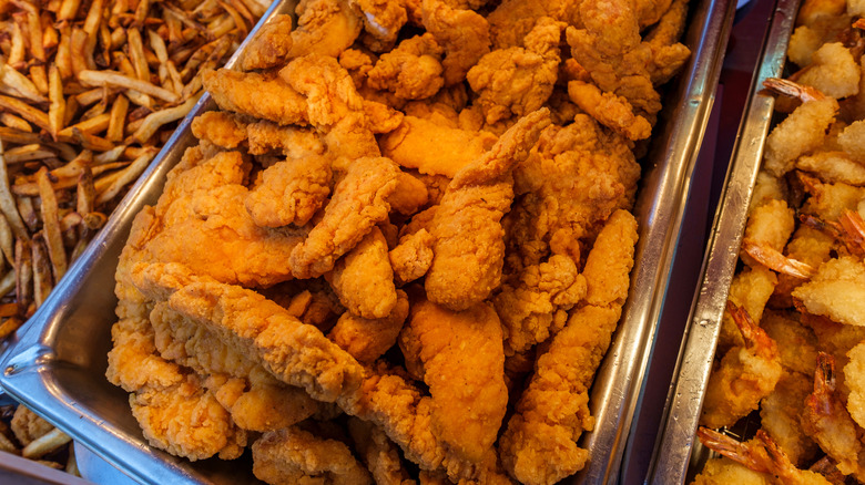 How long can cooked chicken be left out at room temperature?