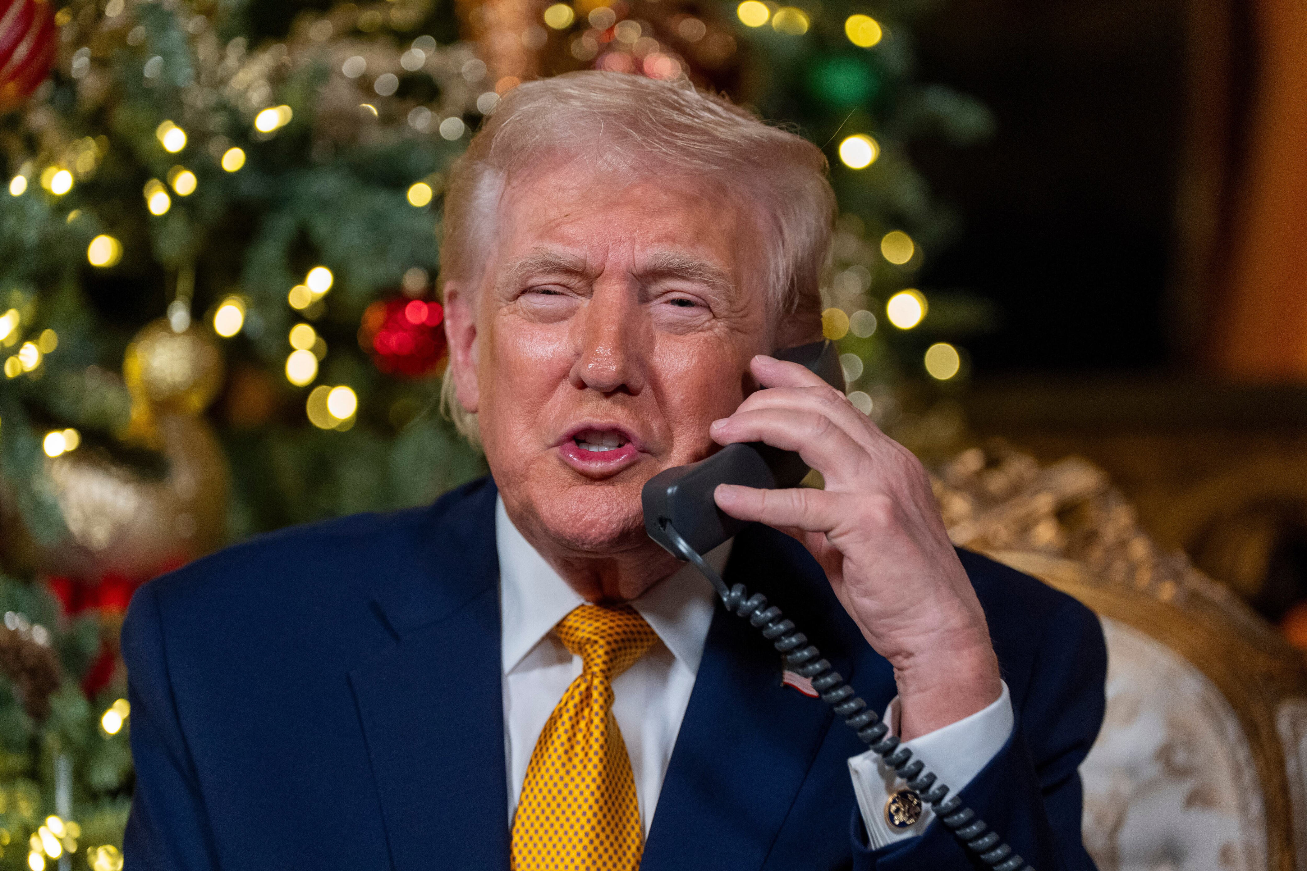 Trump's holiday calls blend cheer, policy promotions