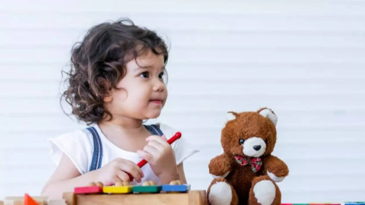 What does it mean when a toddler talks to toys?