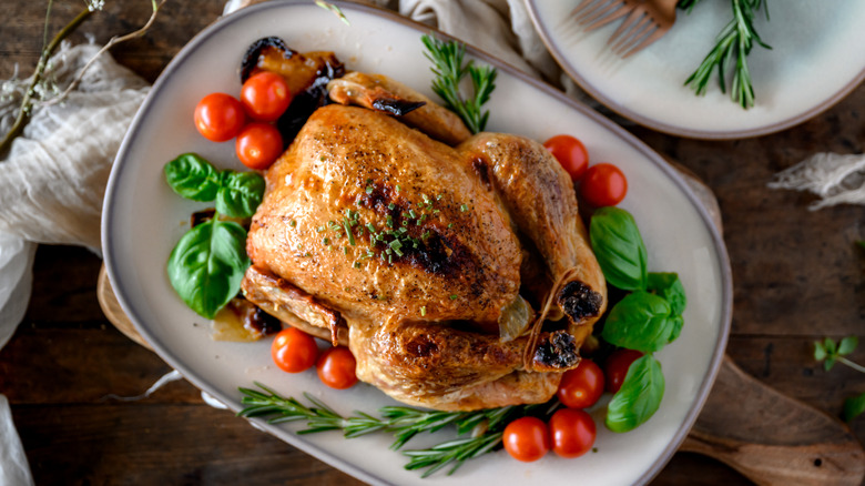 How long can cooked chicken be left out at room temperature?