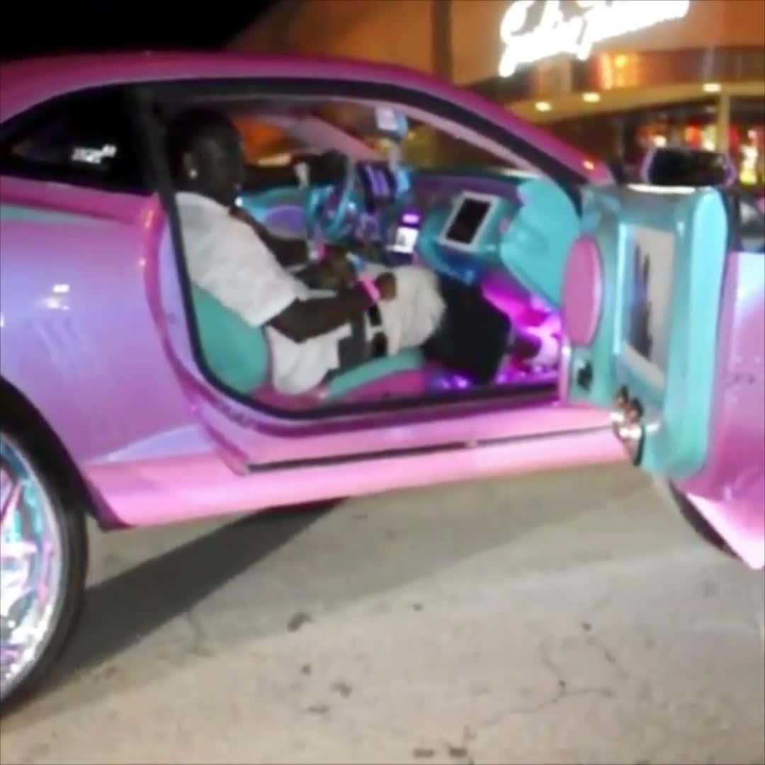 Outrageous pink Camaro on 32's floaters on South Beach #flashBack