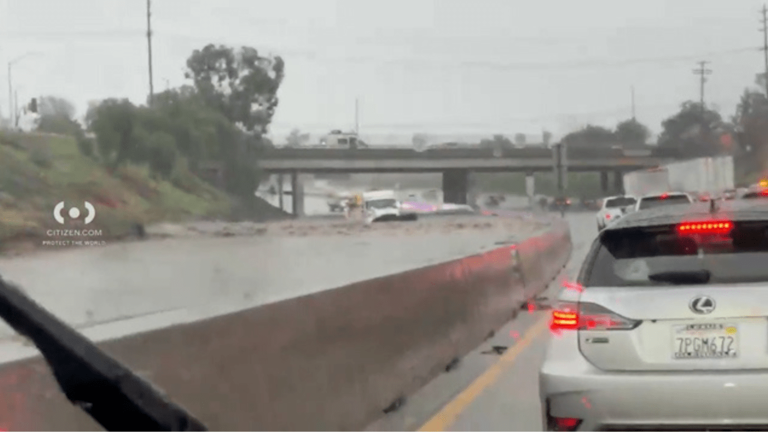 Torrential rain leaves Los Angeles freeway underwater