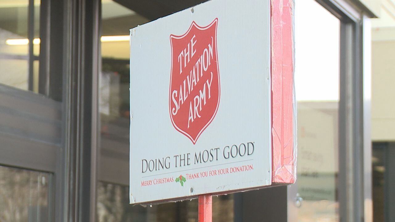 Salvation Army bell ringers collect donations for red kettle campaign
