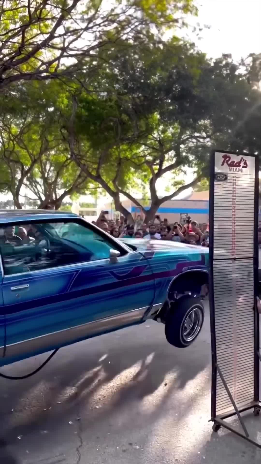 Hopping Oldsmobile Cutlass at the lowrider show