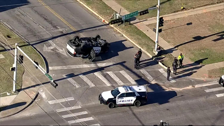 Dallas police vehicle flipped after crash, 2 officers hospitalized ...