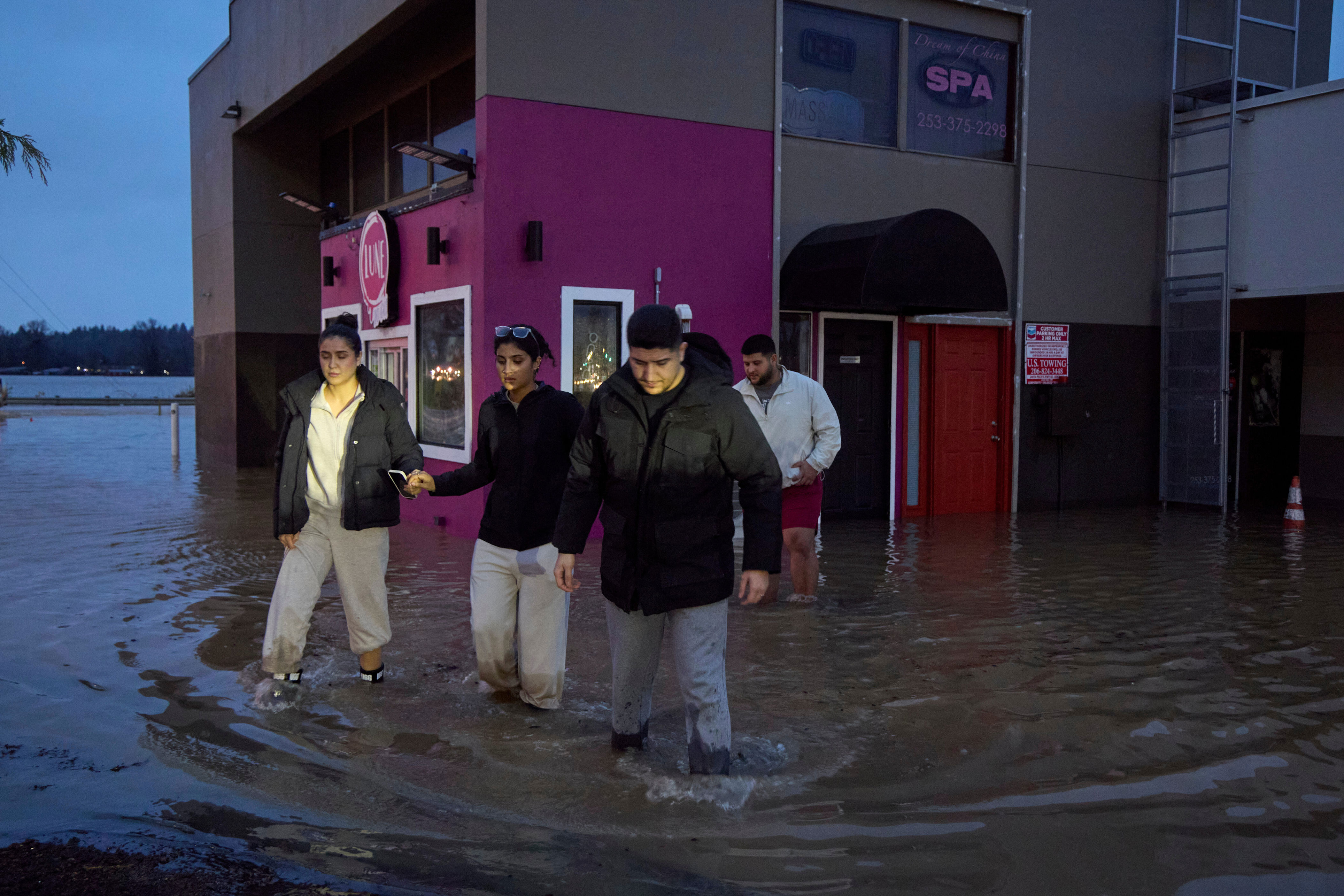 Destructive flooding hits Washington state, with six rivers at ...