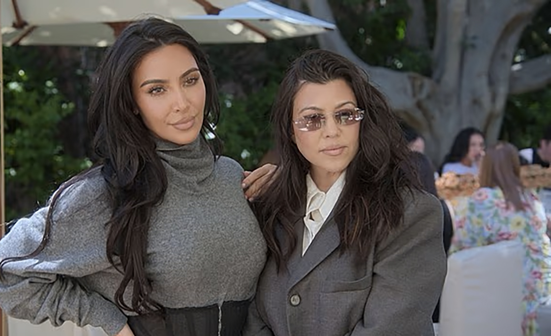 Kim Kardashian mortified as sons fight on stage during her law school ...