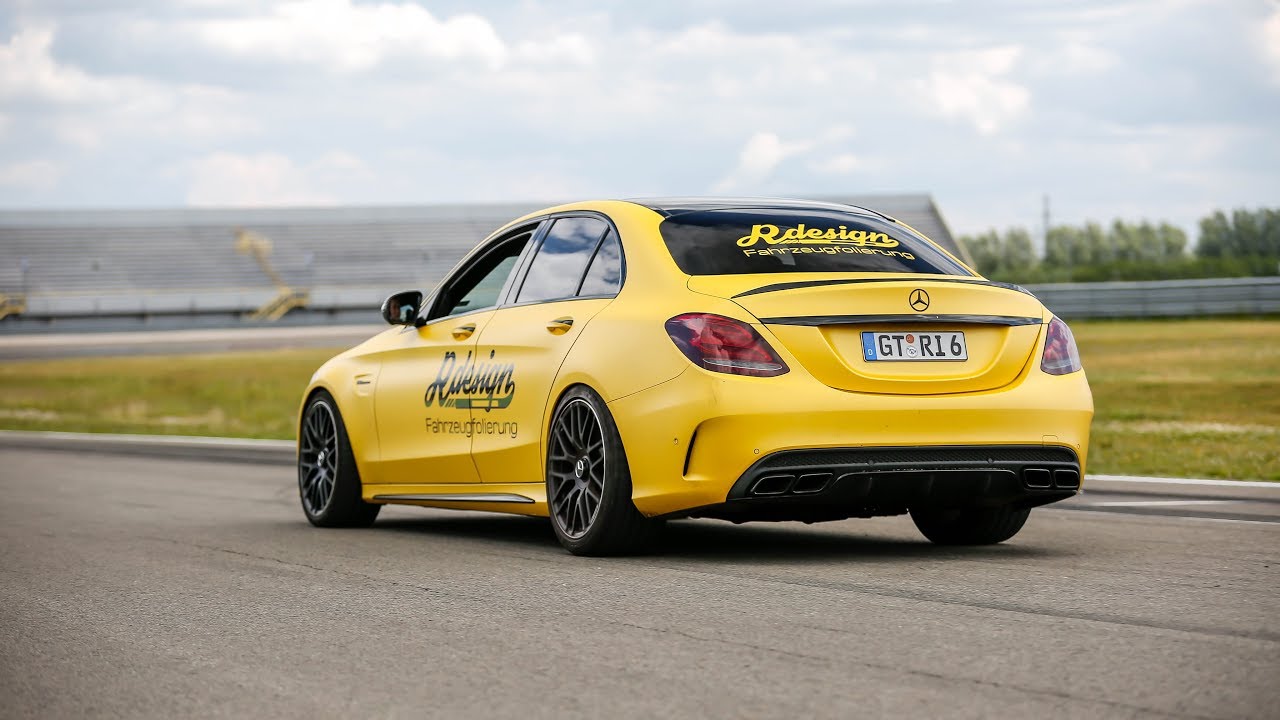 Accelerations and burnout in matte yellow Mercedes C63 S AMG