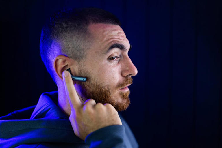 The AI earbuds shattering the language barrier in sport dressing room