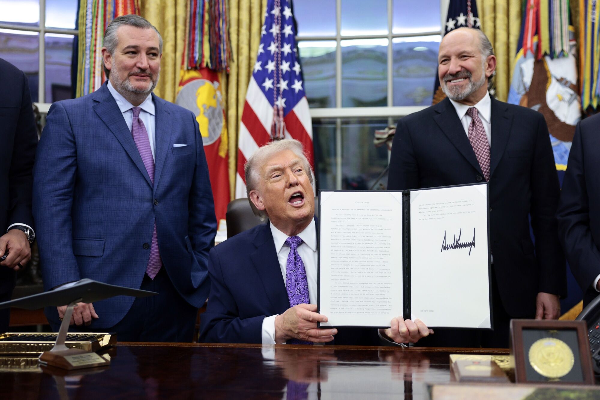 Trump signs order seeking to limit state-level AI regulation