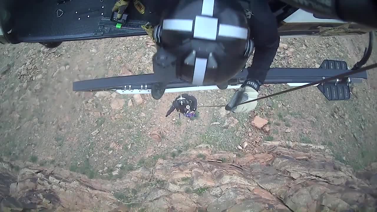 Stranded base jumper hanging from cliff rescued in Utah