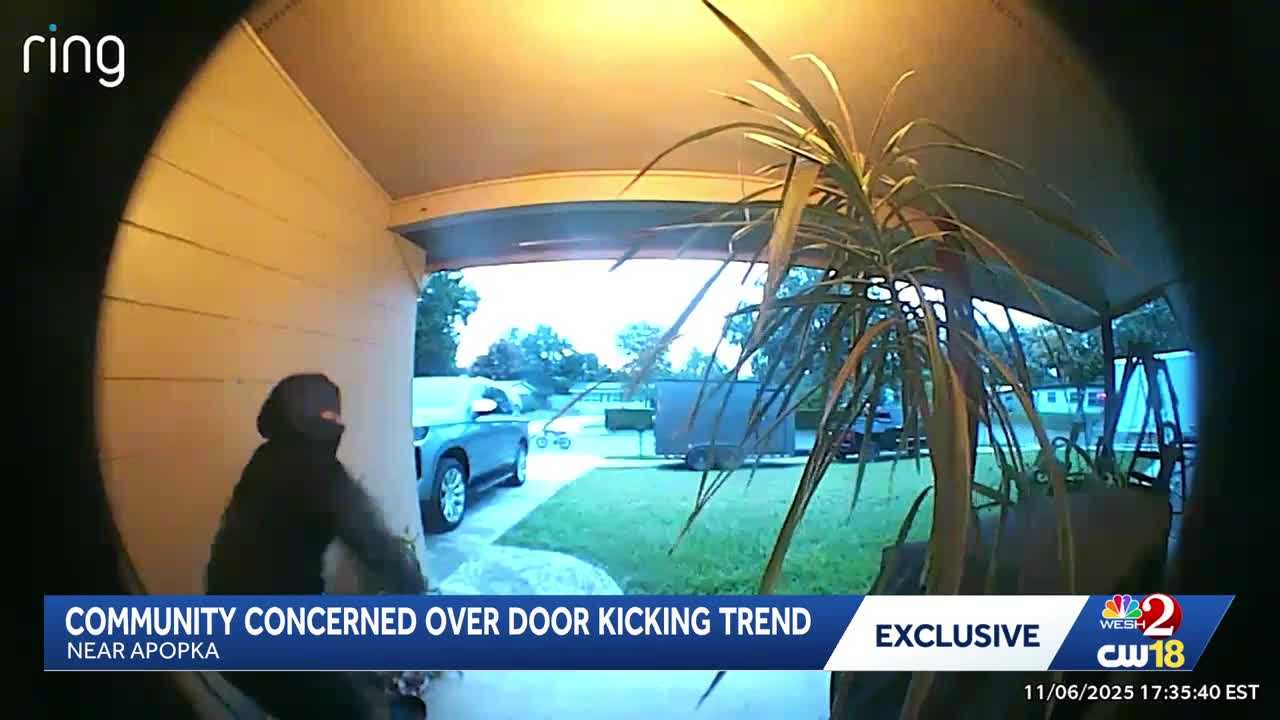 'Split the door': Dressed in black with just eyes showing, someone ...