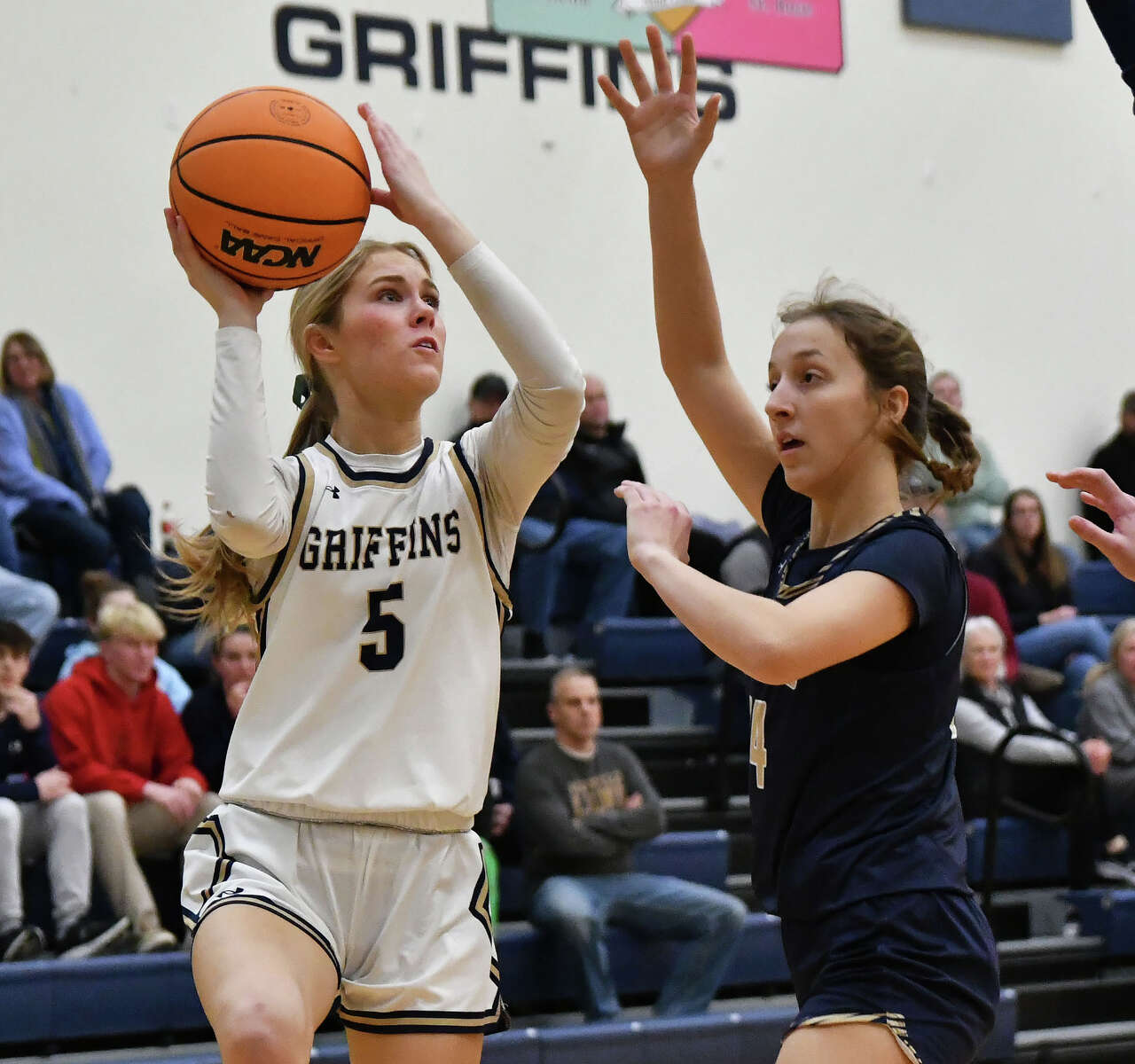 Alexa Jones' career game leads Father McGivney girls to win