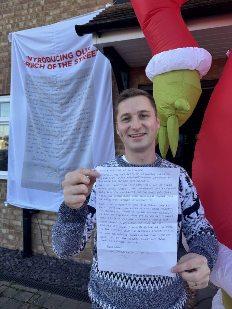Man puts up 16ft Grinch to join festive decorations after angry ...