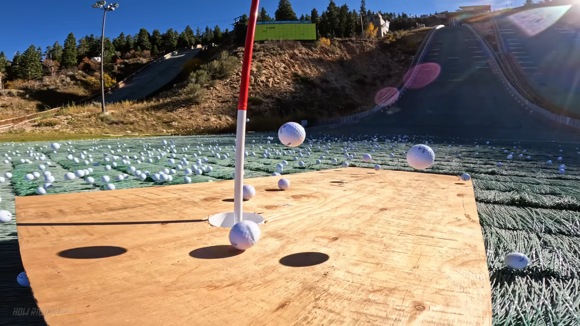Can you get a hole-in-one with 2,000 golf balls down an Olympic ski jump?