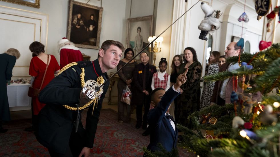 Queen Camilla's new equerry settles into role as he helps children ...