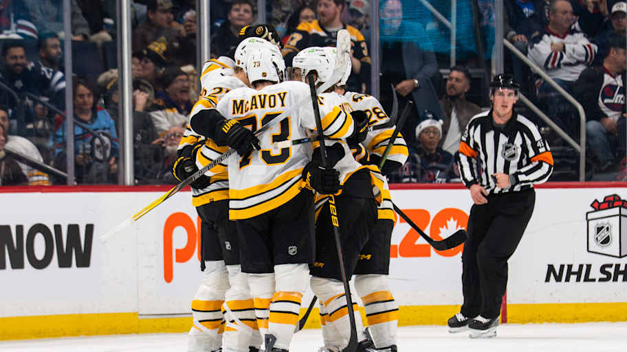 Shorthanded Bruins ground Jets with six-goal outburst