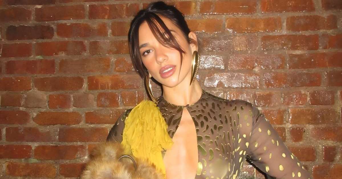 Dua Lipa swaps Gucci fit for completely sheer top with huge cutout