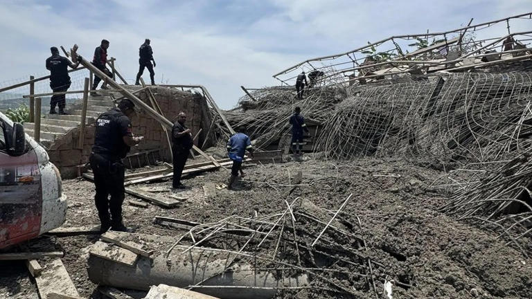 Update: Two dead and more still trapped after temple collapse in ...