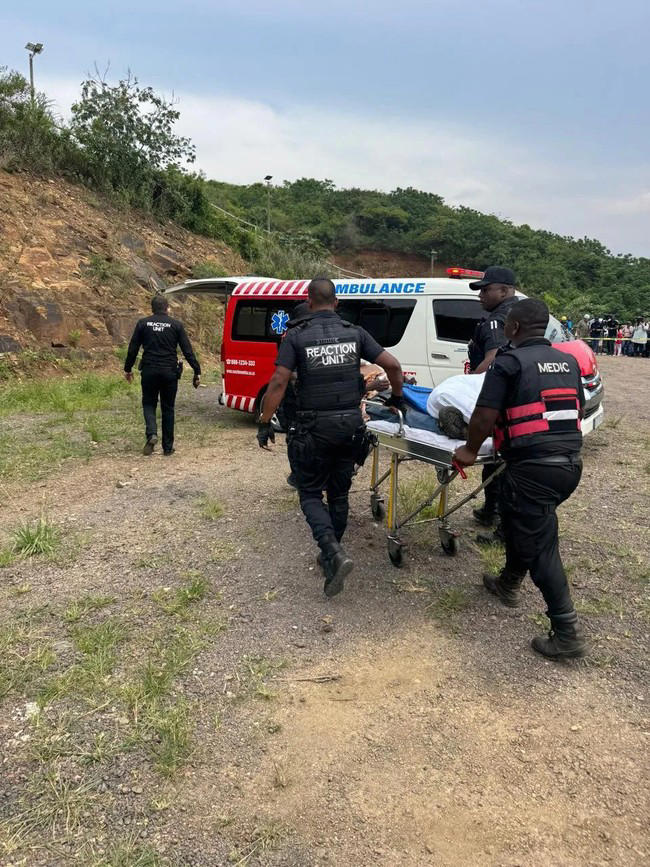 Update: Two dead and more still trapped after temple collapse in ...