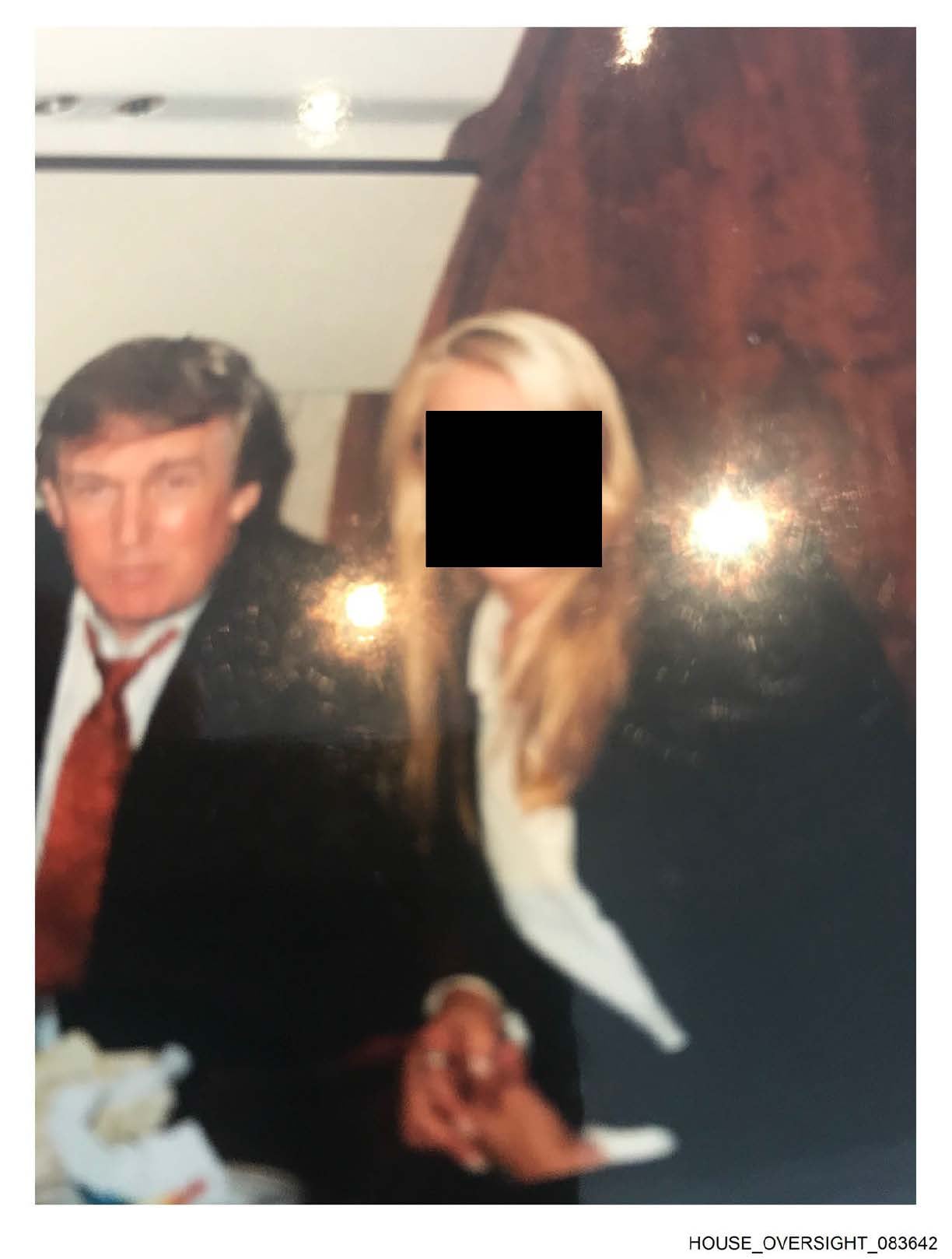 Trump Pictured with Mystery Women in Shock Epstein Photo Dump