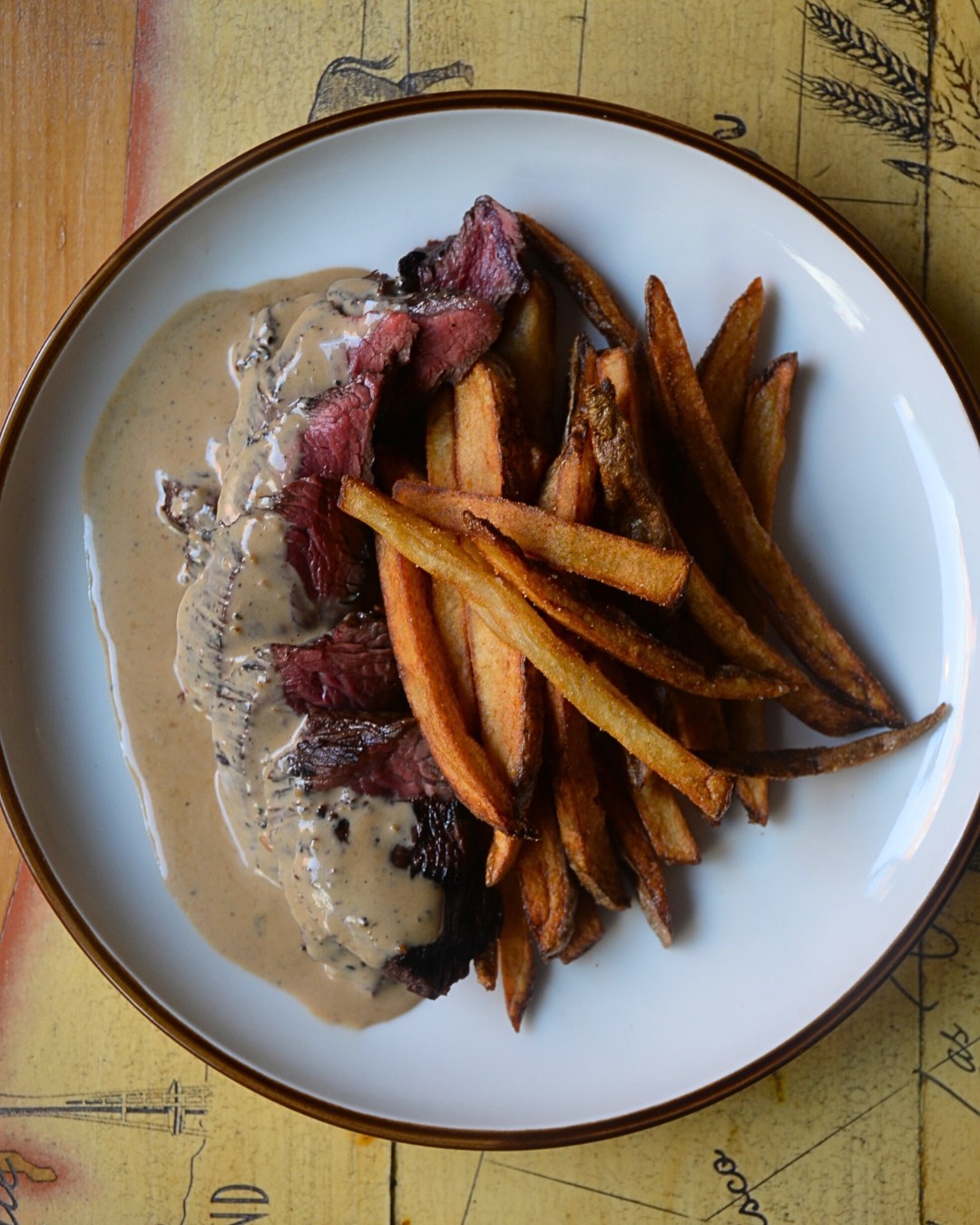 An eclectic '90s-era cafe scales up to serve dinner in Columbus Circle