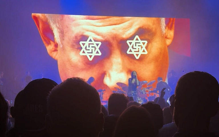 Primal Scream concert visuals combine swastikas and Stars of David ...