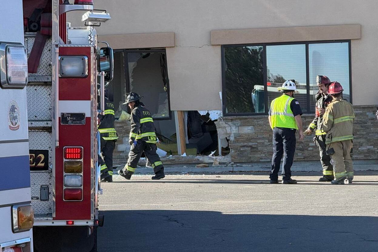 Car drives into building on N College Road