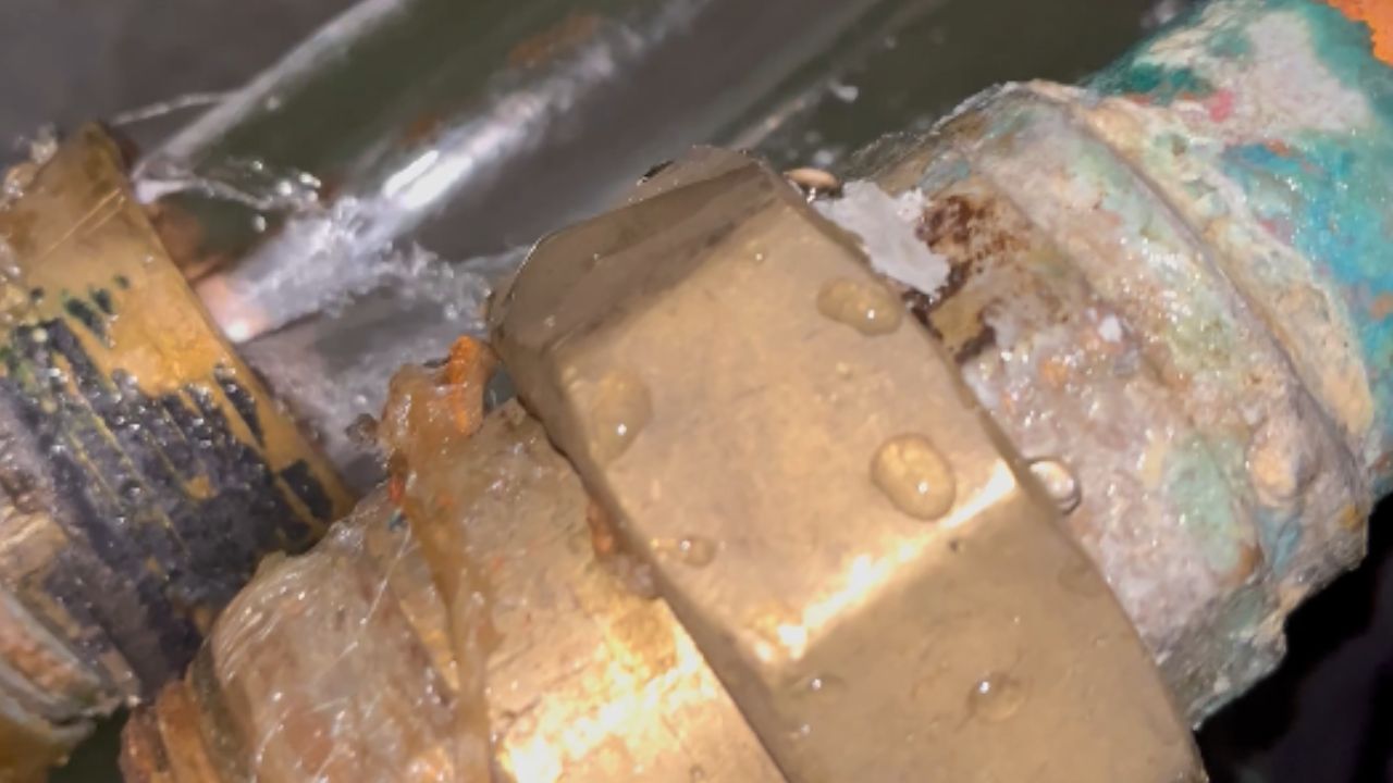 Insane length of solid ice coming out of a frozen pipe unbelievable ...