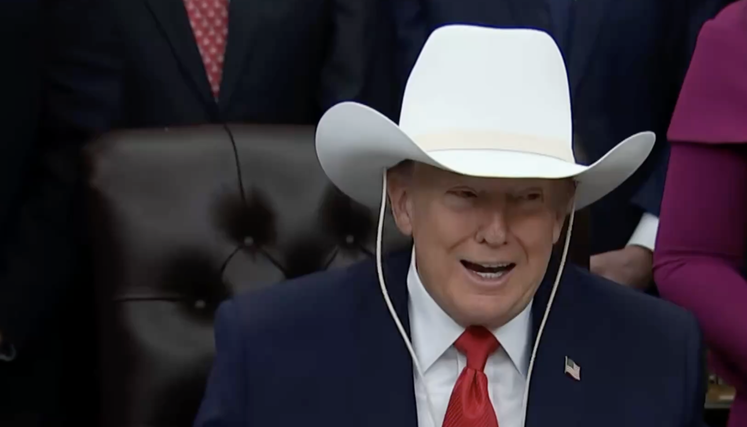 'You've got to take a picture': Trump puts on cowboy hat during bill ...