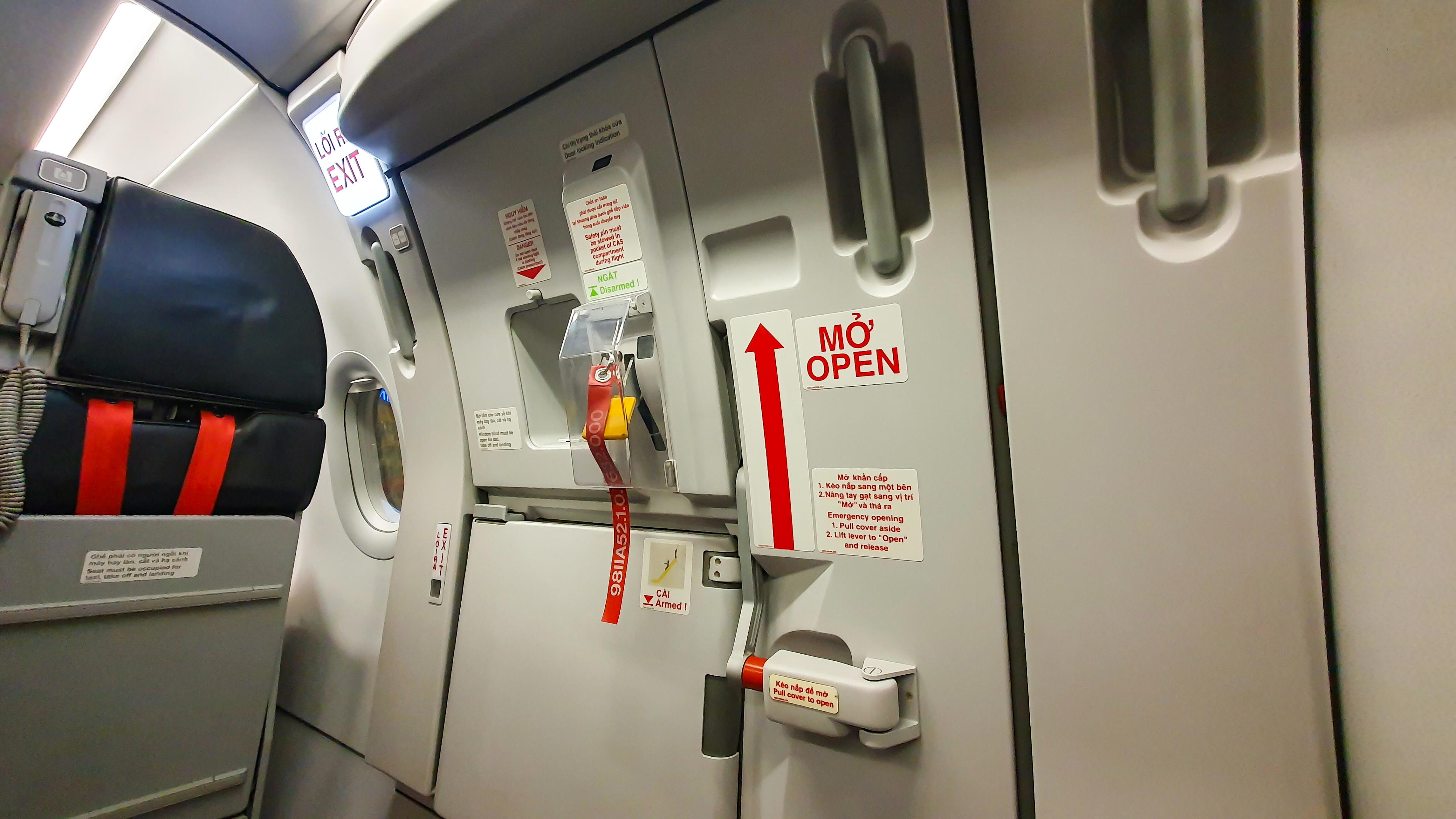 Plane makes emergency landing after passenger tried to open door mid flight