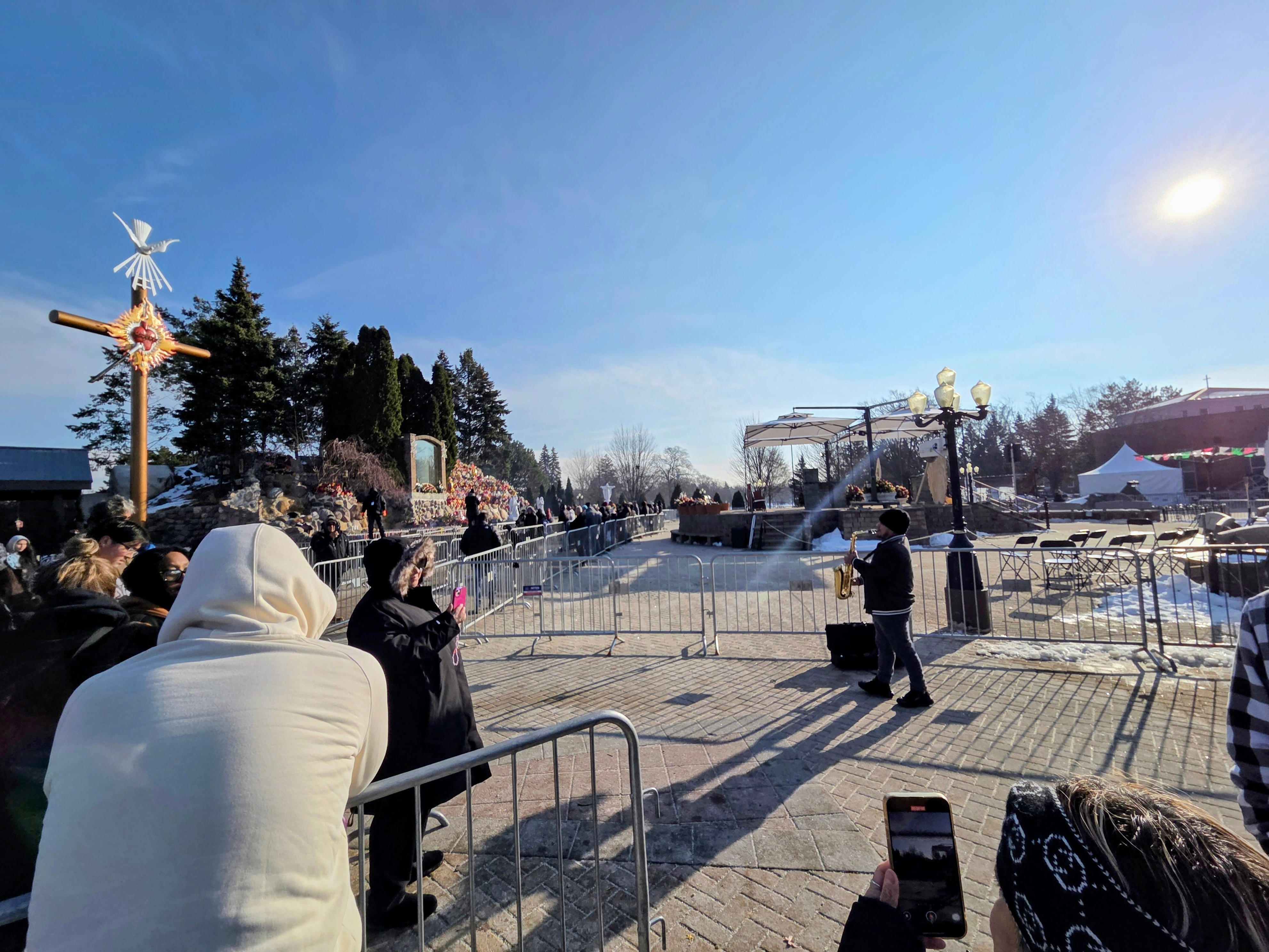 Catholics face cold and immigration fears to honor Virgin Mary