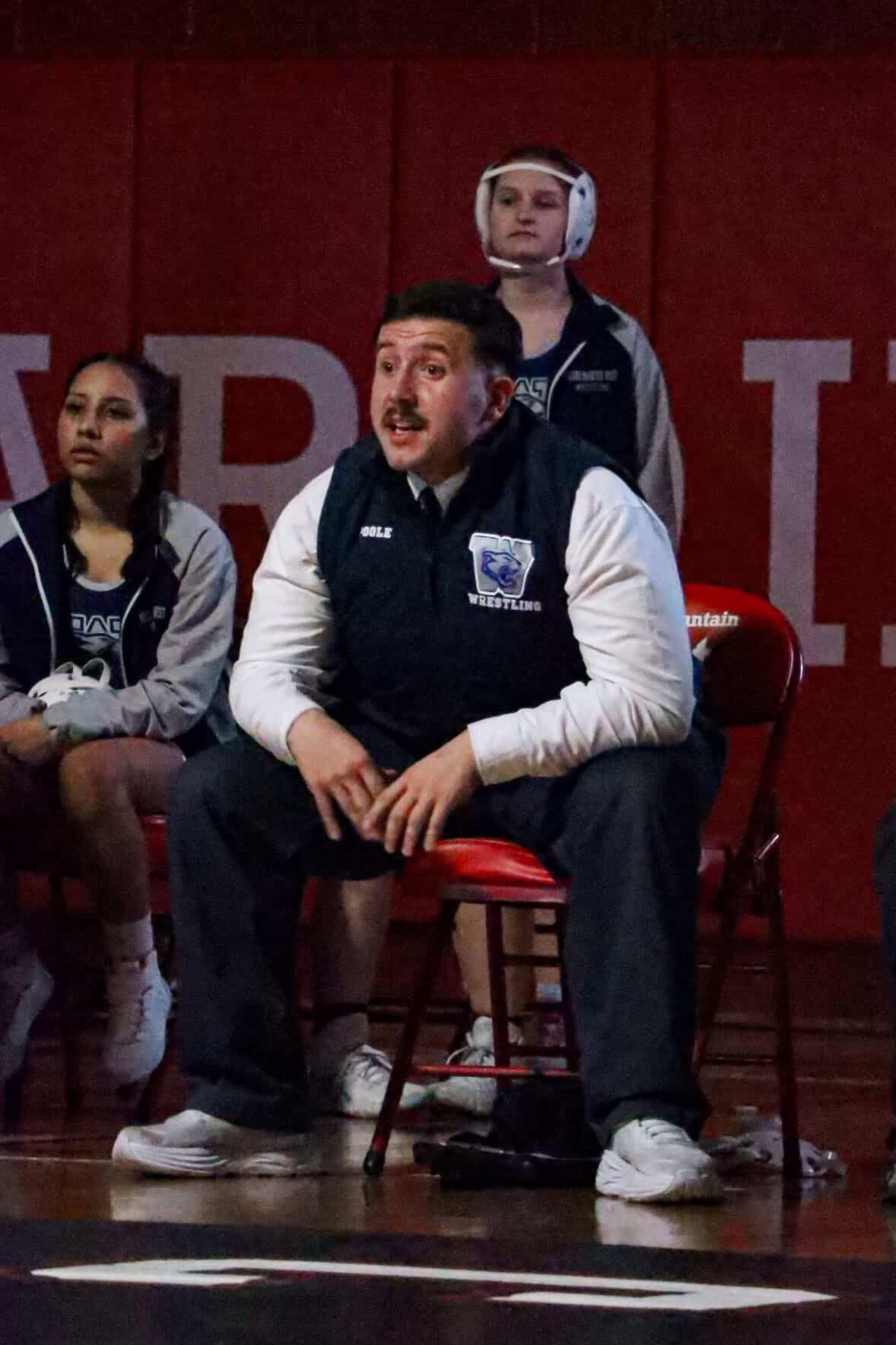 Will Poole is living the dream leading West girls wrestling