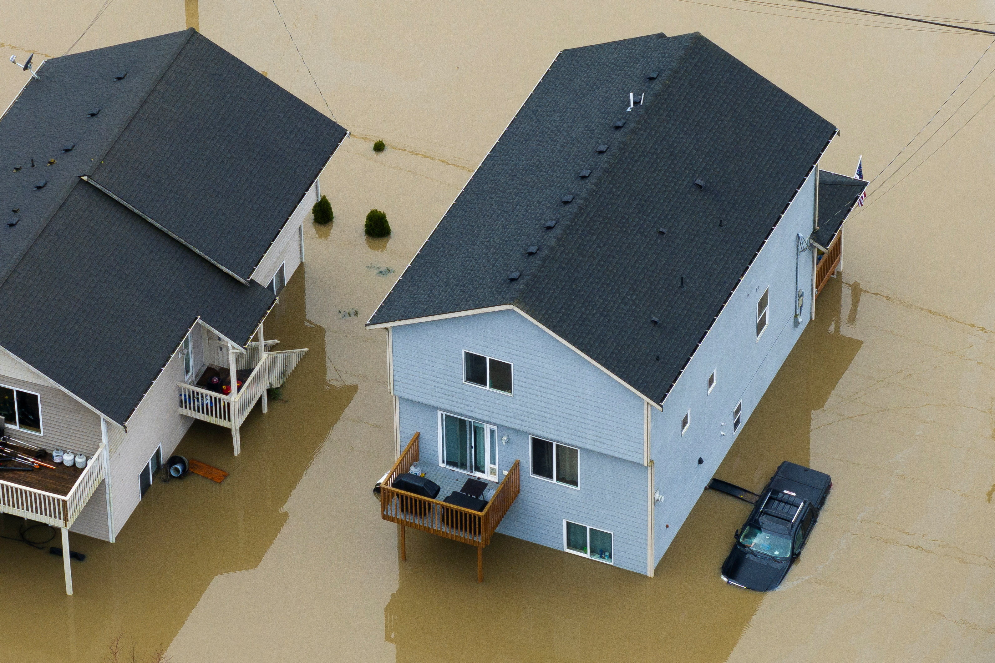 Washington state experiences historic flooding as Skagit River hits record high level. See ...