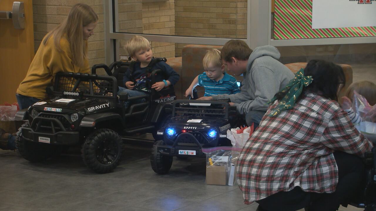 Arkansas State students give adaptive electric cars to children with ...