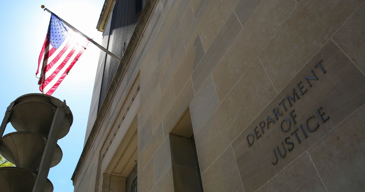 DOJ sues four states for violating federal election law