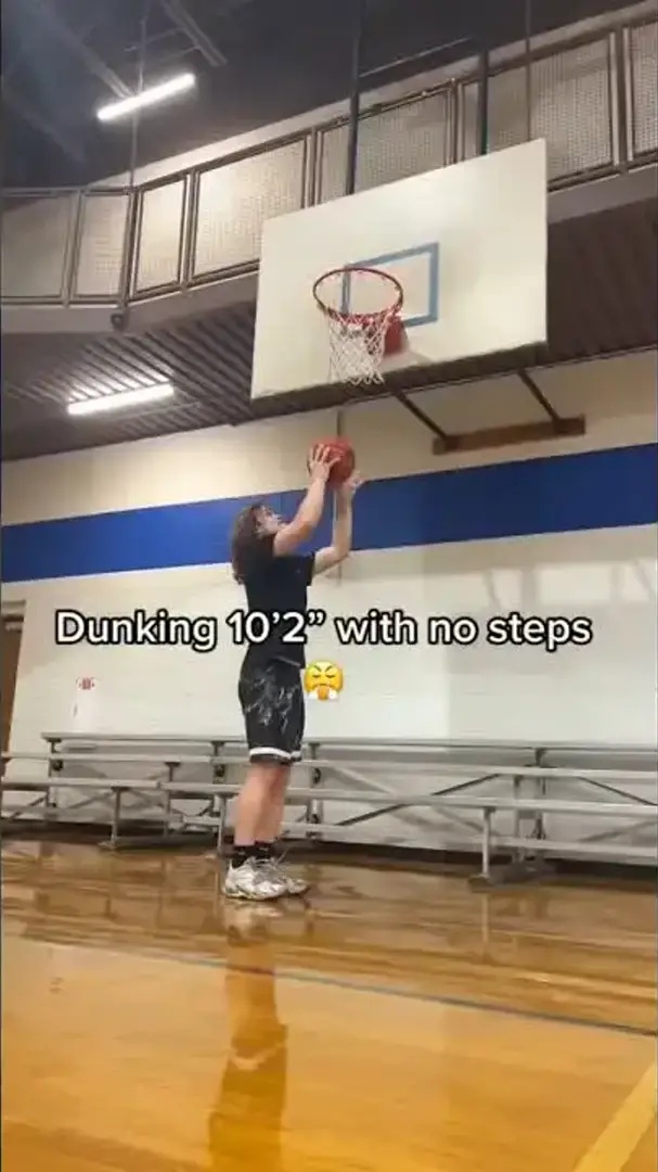 Insane 10ft+ standing reach dunk