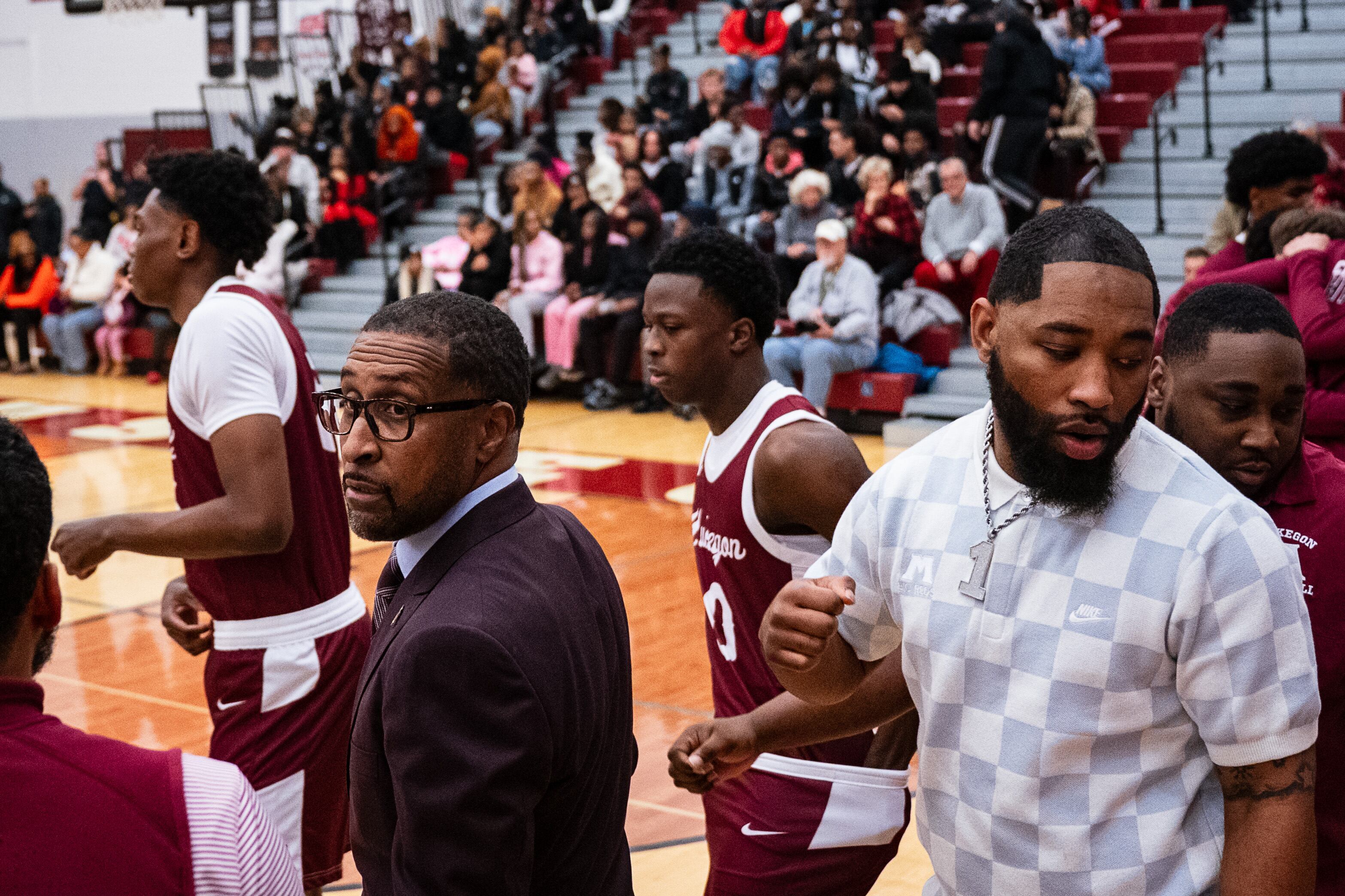 Photos: Muskegon tops Marquette in varsity boys basketball season opener