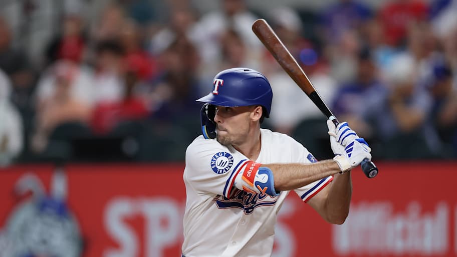 Rangers' plan for young outfielder focuses on testing him against his ...